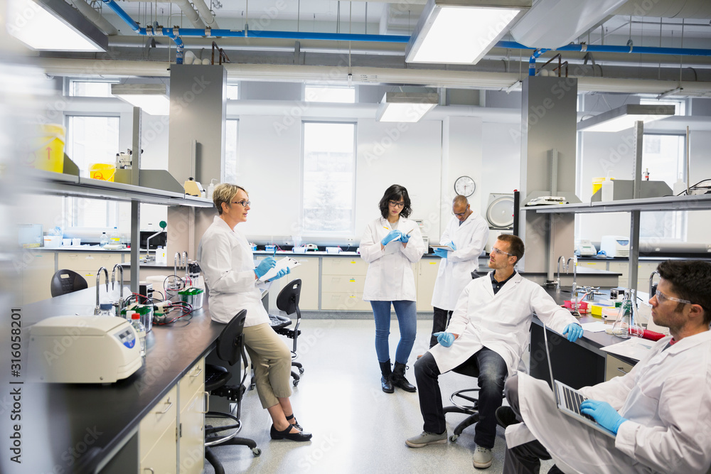 Professor leading science class in laboratory Stock Photo | Adobe Stock