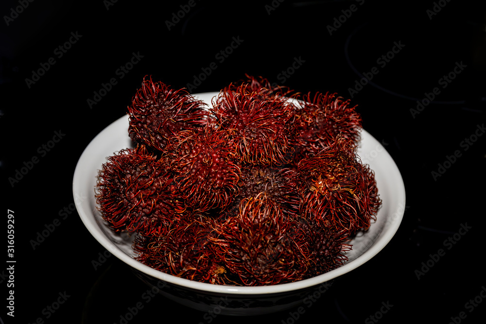 Rambutan tropical fruit.The rambutan is sweet and juicy fruit. Native ...