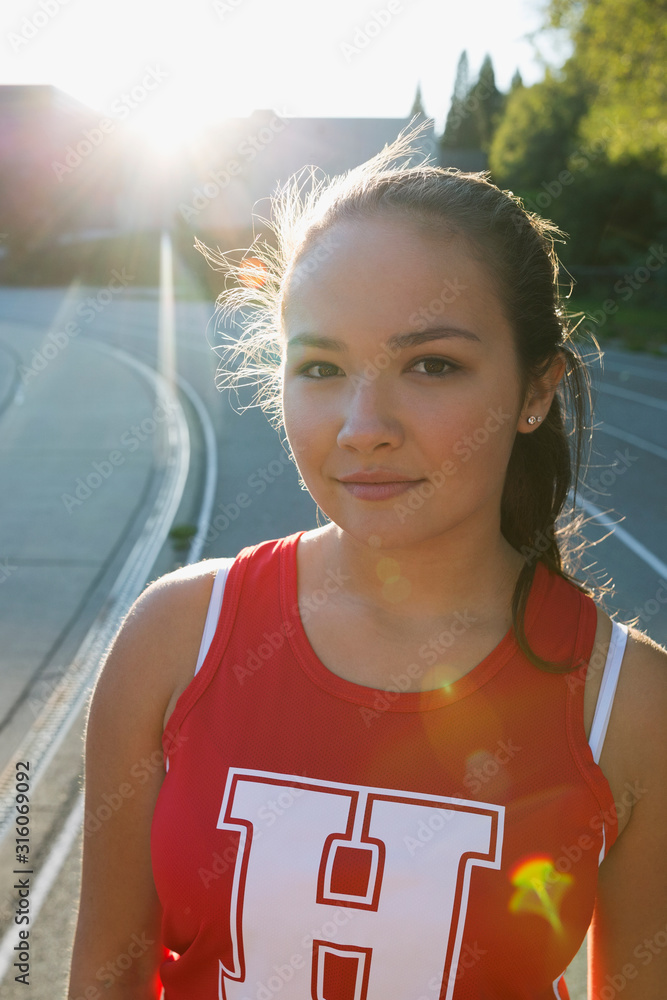 Portrait female high school track and field athlete Stock Photo | Adobe ...