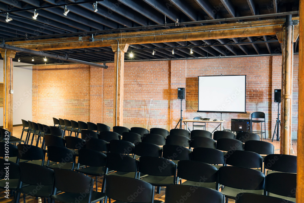Interior of conference room with projection screen and chairs Stock ...