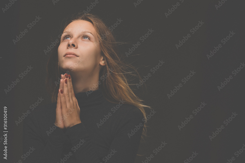 Young woman praying to God. Christian life crisis prayer to god. Stock ...