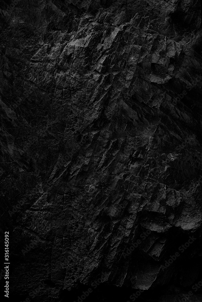 Dark Face Shabby Cliff Face And Divided By Huge Cracks And Layers ...