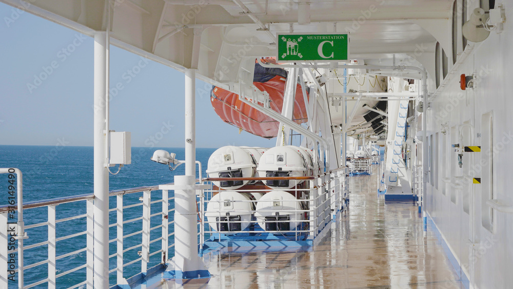 walk deck on a cruise ship. safety on the ship, lifeboat, liferafts ...