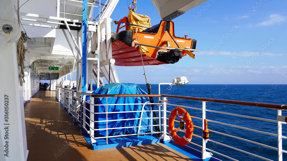 walk deck on a cruise ship. safety on the ship, lifeboat, liferafts ...