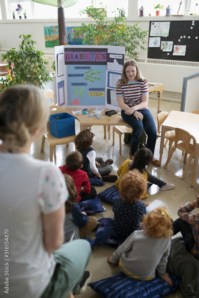 Preschool students watching tween girl give presentation about diabetes ...