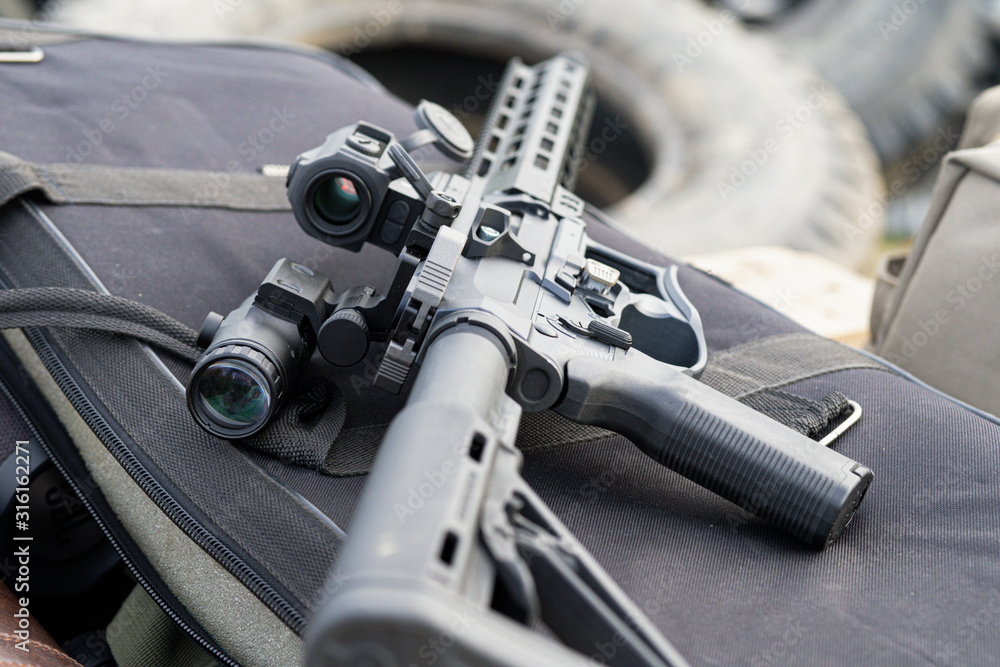 Modern AR15 rifle with a sight aim Stock Photo | Adobe Stock