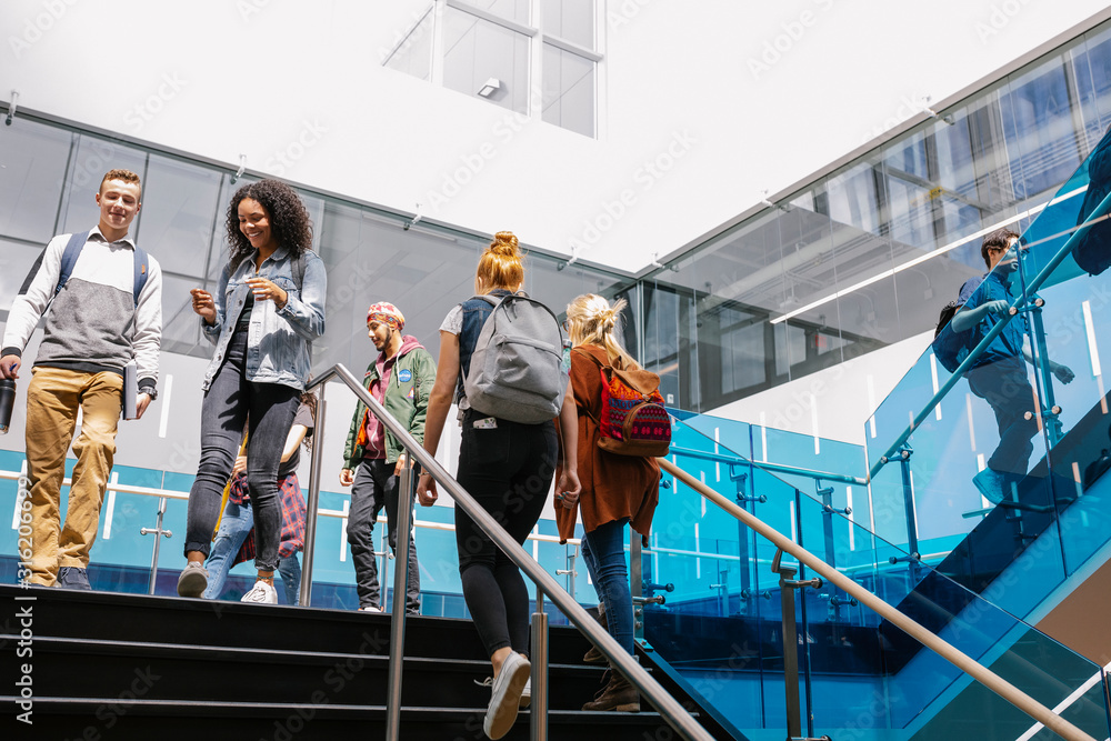 Students on staircase in university Stock Photo | Adobe Stock