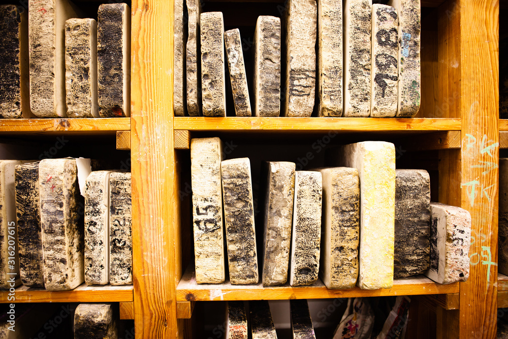 In the workshop for lithography. Lithography stone on shelf Stock Photo ...