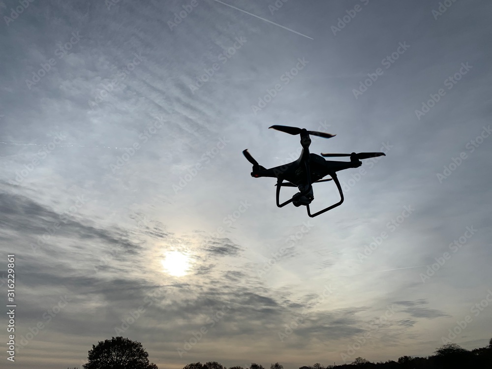 Phantom 4 Pro Obsidian flying in the sky Stock Photo | Adobe Stock