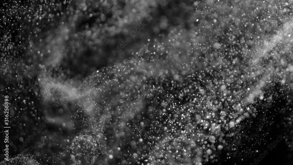 Vidéo Stock Slow movement of microparticles in the form of small and ...