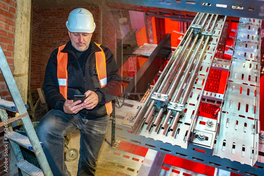 The engineer plans to install electrical wiring in the new building ...