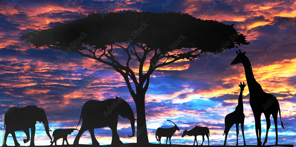 Composite African safari scene with a sunset background. Silhouette of ...