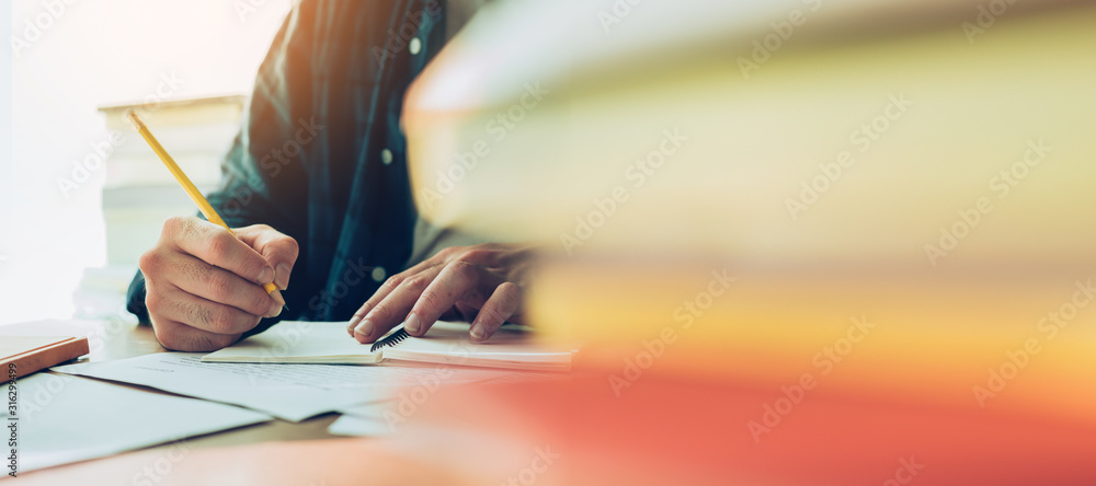 high school,university student study.hands holding pencil writing paper ...