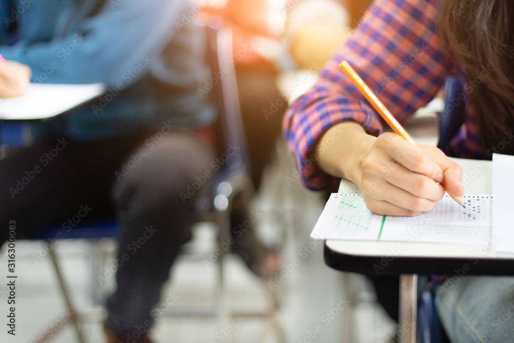 high school,university student study.hands holding pencil writing paper ...