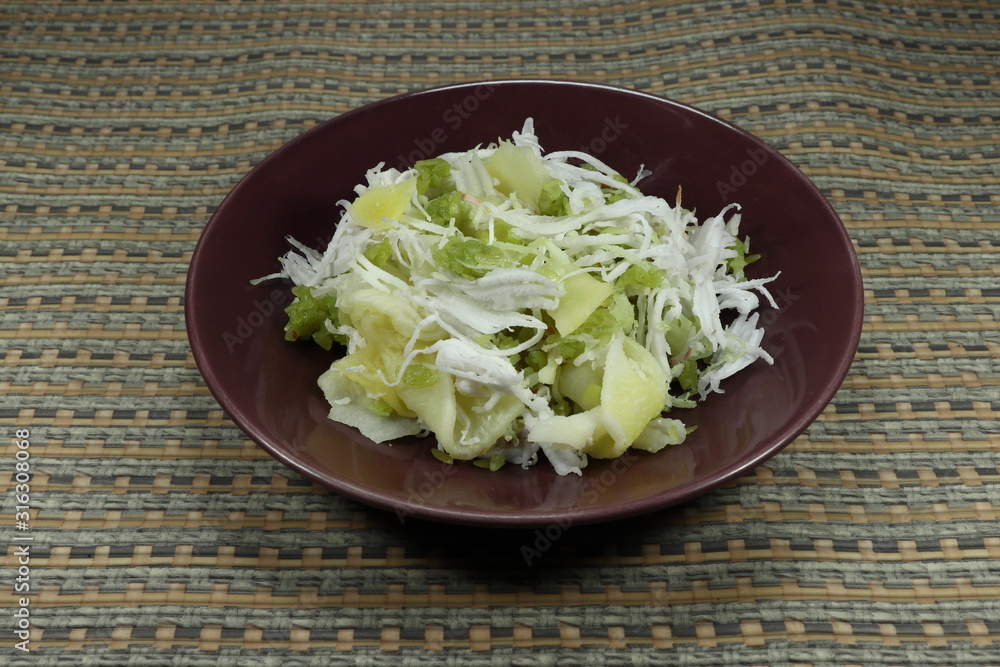 Traditional dessert in Thailand on the plate. Local sweet steamed wild ...