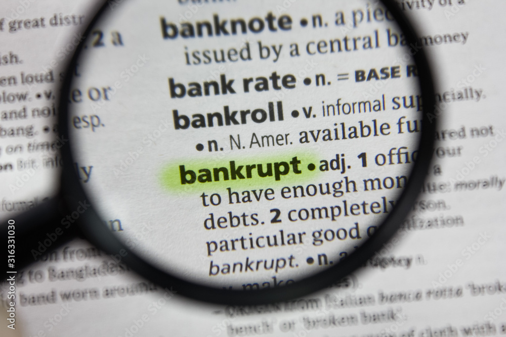 The word or phrase bankrupt in a dictionary. Stock Photo | Adobe Stock
