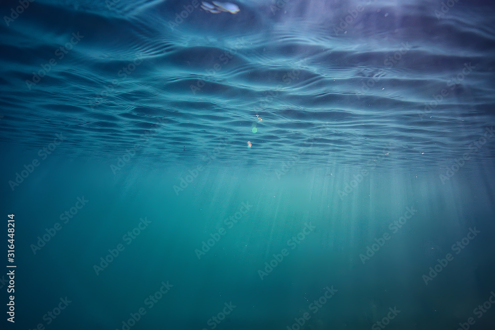 ocean water blue background underwater rays sun / abstract blue ...