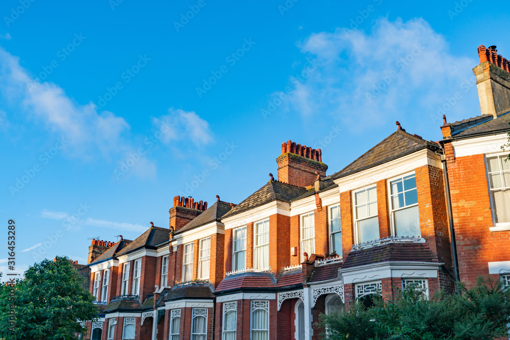 Georgian style and era red brick terrace houses. Stock Photo | Adobe Stock
