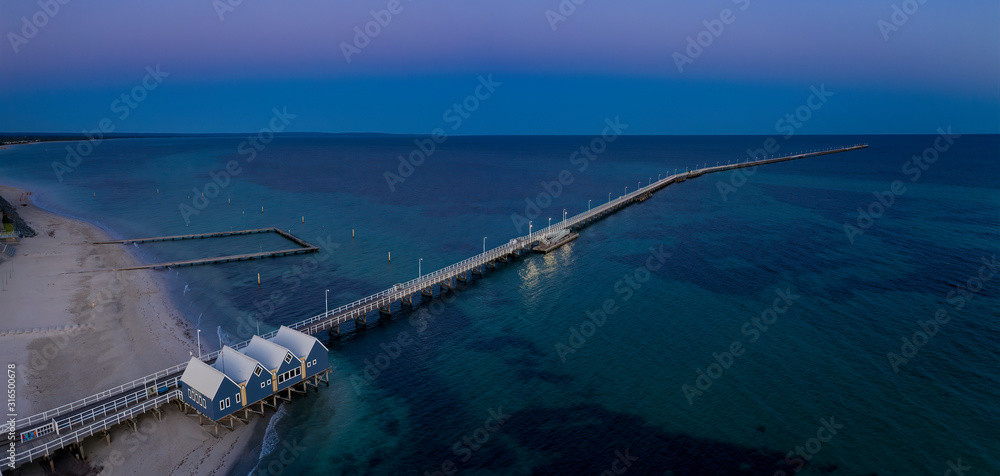 Panoramic aerial dawn view of the iconic Busselton Jetty, located 220 ...
