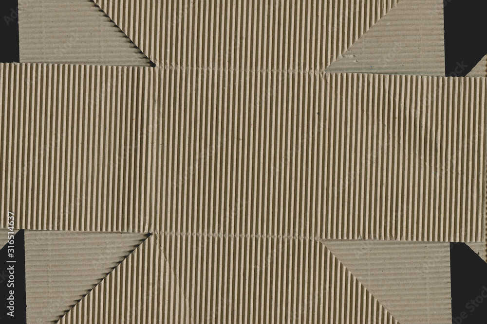 Close up grainy decorative light brown vintage rough sheet of carton ...