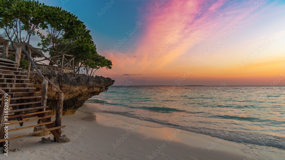 Sonnenuntergang am Strand von Sansibar Stock Photo | Adobe Stock