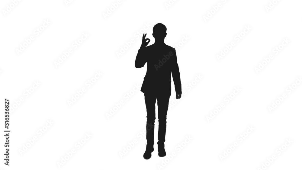 Black and white silhouette of young business man in suit moving forward ...