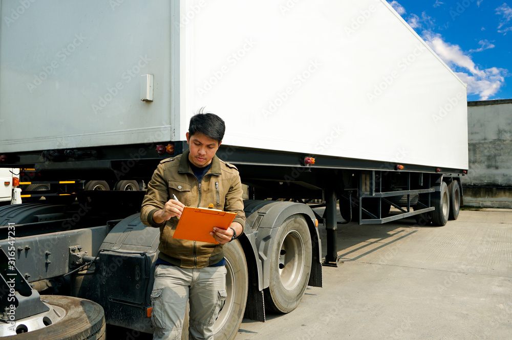 Asian Truck Driver is Checking the Semi Truck's Engine Maintenance ...