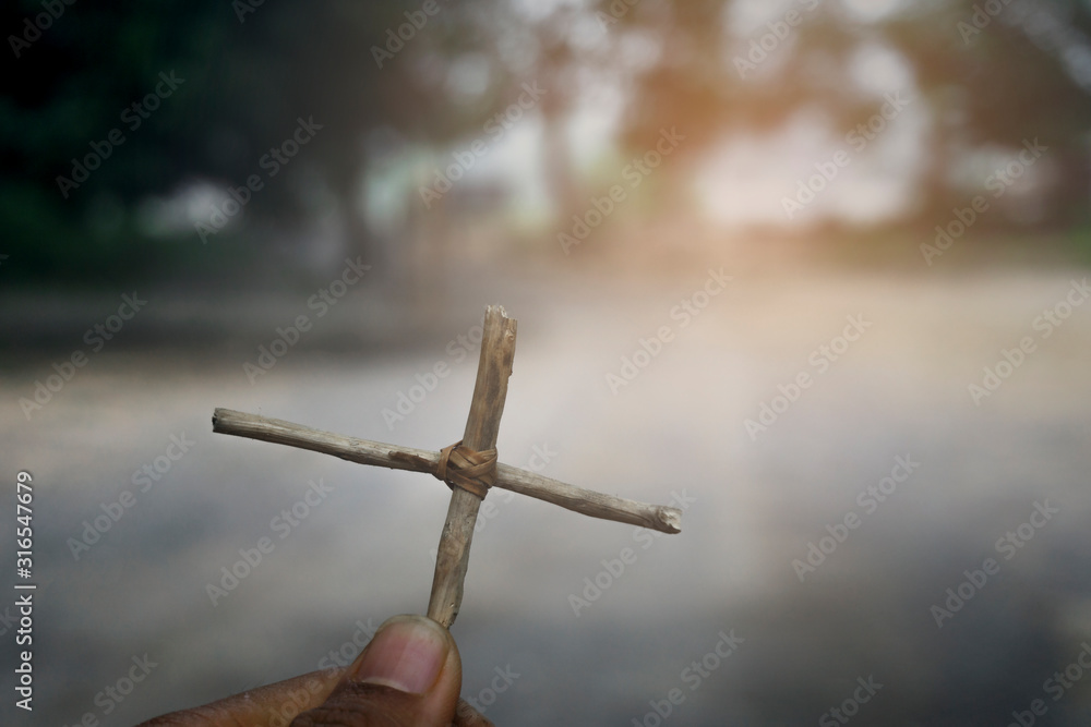 Hand holding a cross. Jesus Christ. Symbol of The belief christ ...