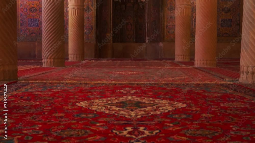 Tilting up | Beautiful interior with Persian carpet, decorated pillars ...