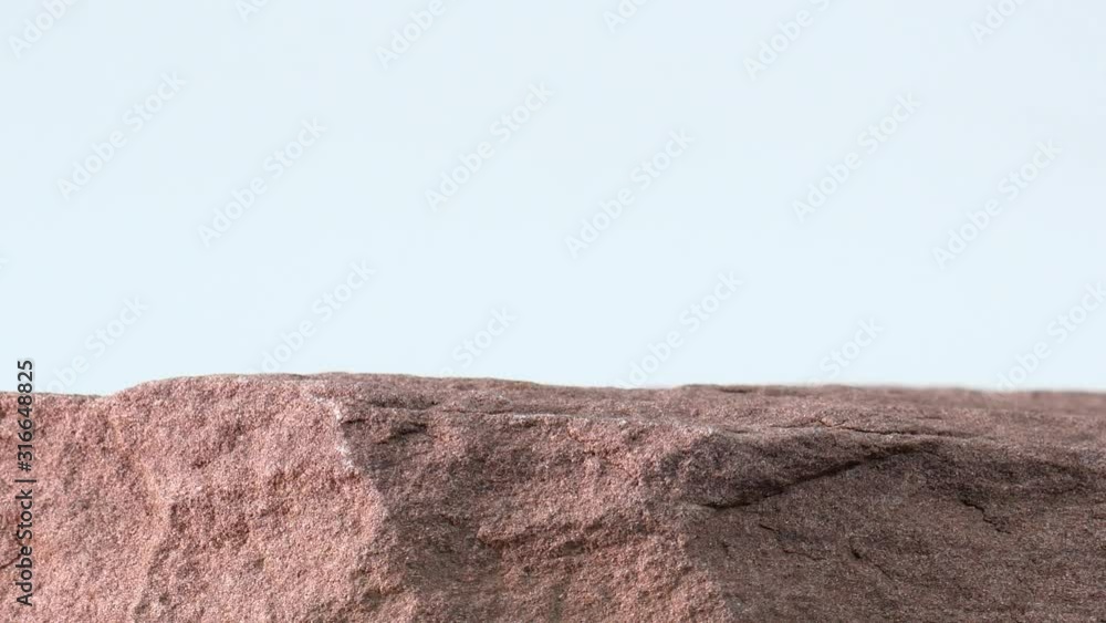 Close up Move the camera angle from left to right, Rock cliff on White ...