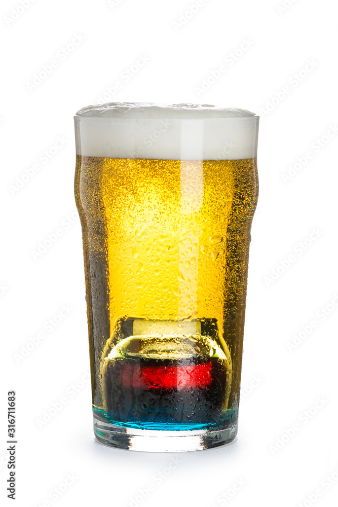 Depth charge cocktail of beer, liqueur, grenadine and vodka, prepared ...