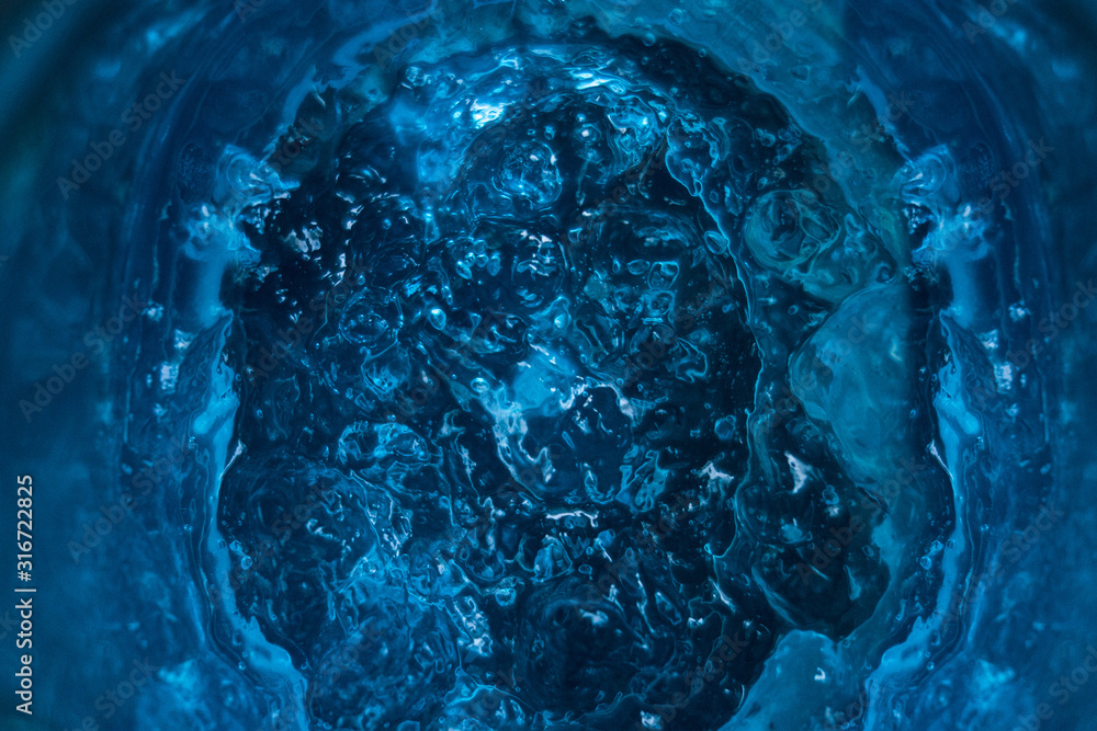 Textured blue substance background. Foam consistence backdrop closeup ...