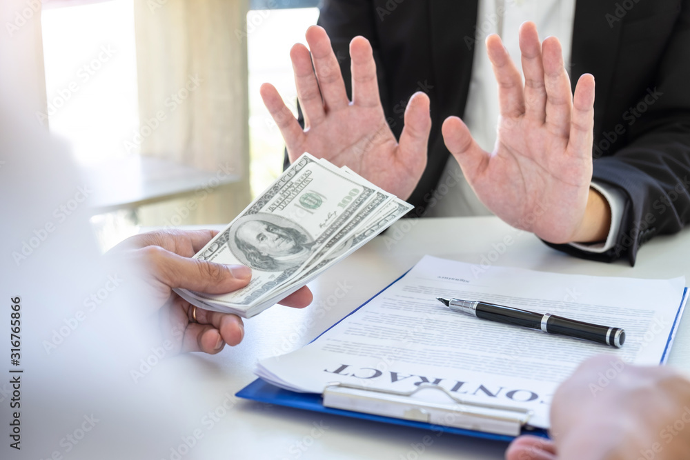 Businessman refusing receive bribe money in the envelope of their ...