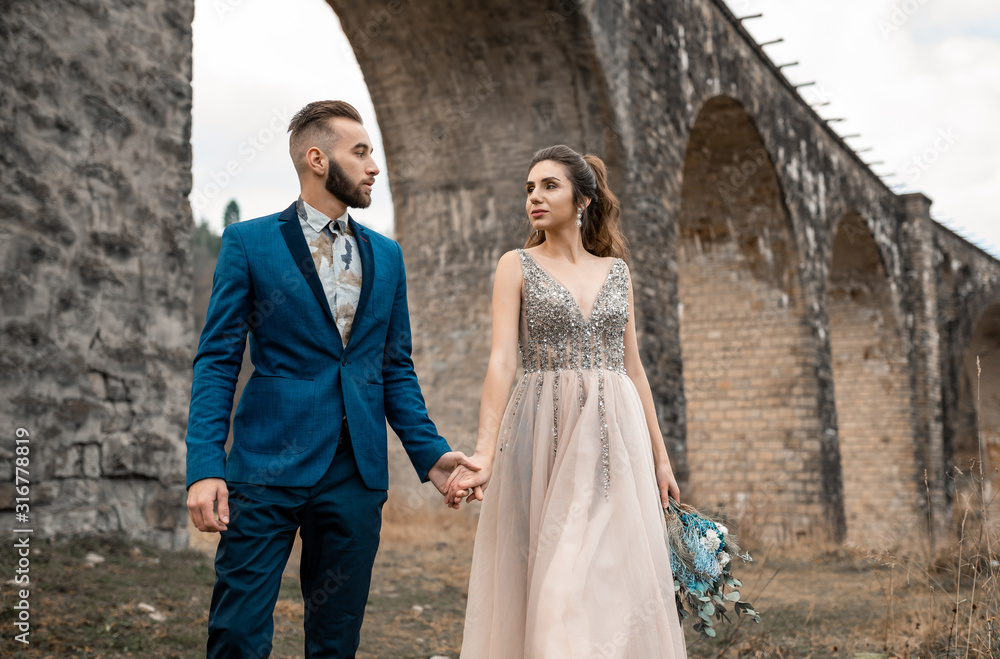 Happy marriage couple indoors, soft sunny lights. Loving man and woman ...
