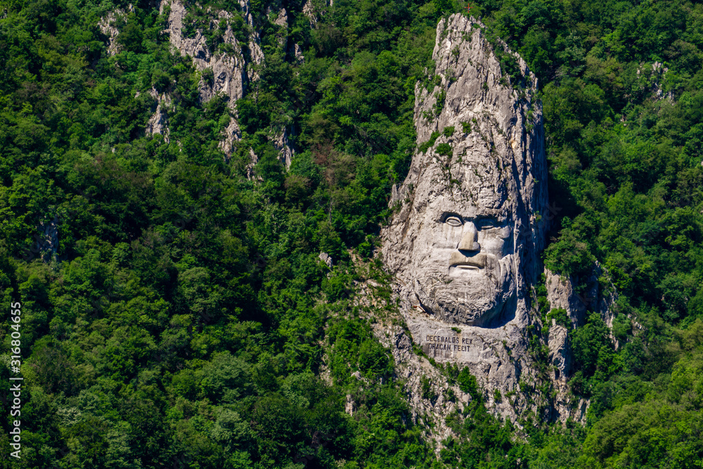 Rock sculpture of Decebalus in Danube gorge Stock Photo | Adobe Stock