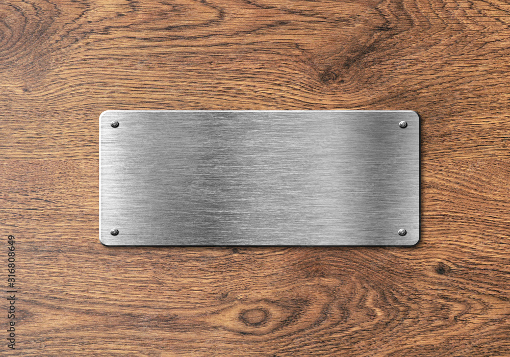 Blank polished silver plate on wooden background to ad text, names or ...