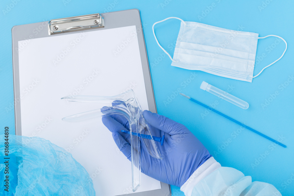 Annual well woman exam, cervix cancer control. Gynecological speculum ...