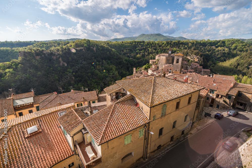Panoramic view of small vilage in Italy with red brick houses and ...
