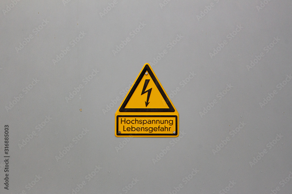 German warning sign "High voltage, danger to life" in german ...