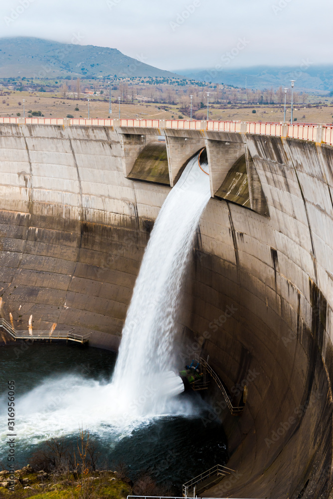 Water reservoir with the sluice open by pouring the water back to the ...