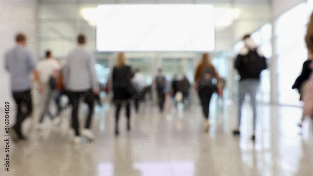 Blurred hallway of a convention center with crowd of people Stock Video ...