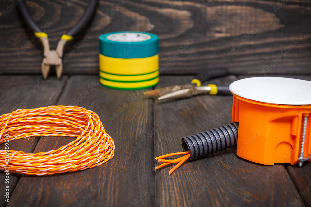 Electrical junction orange box with wires used in the electric ...
