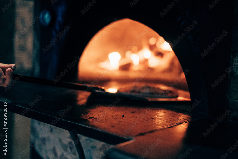 Old vintage oven with the fire Stock Photo | Adobe Stock