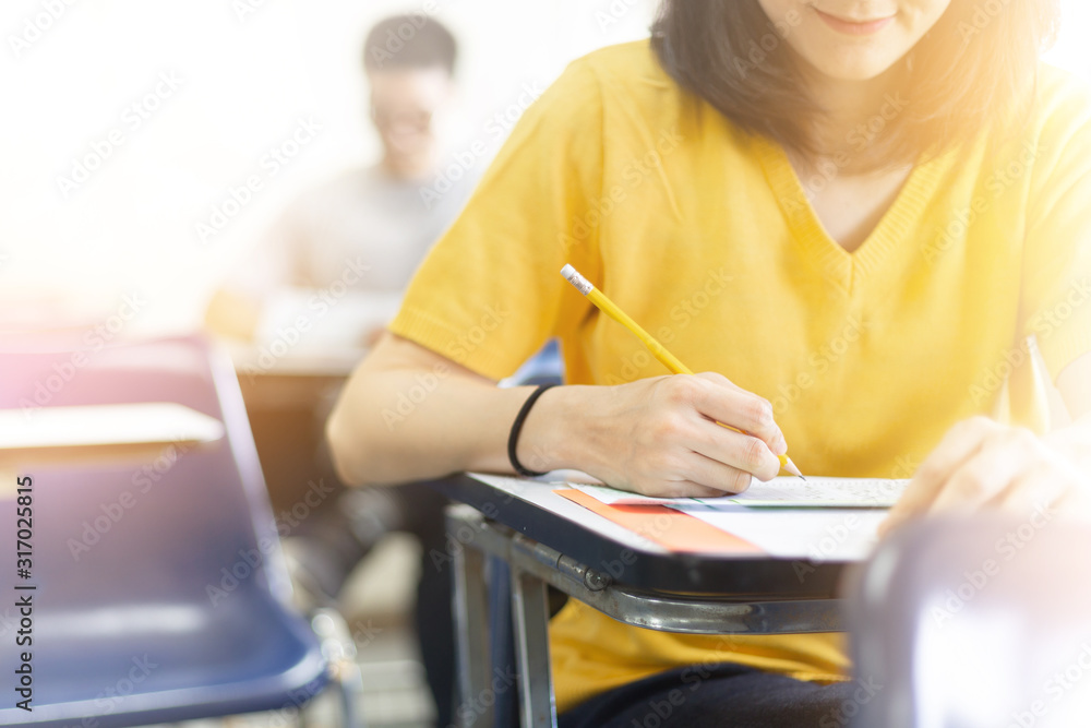 high school,university student study.hands holding pencil writing paper ...