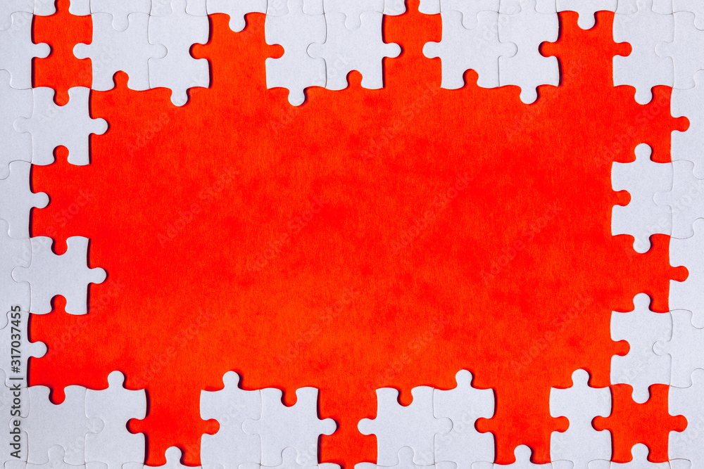 Framing in the form of a rectangle, made of a white jigsaw puzzle ...