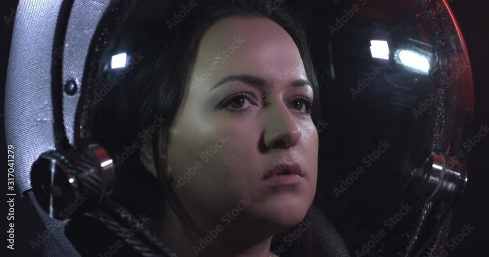 Young Brave Beautiful Female Astronaut In Space Helmet Looking At ...