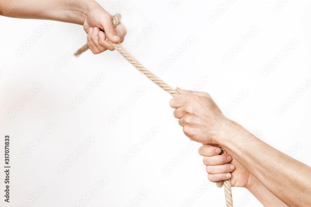 One hand holds the rope and pulls out of the problems of the man ...