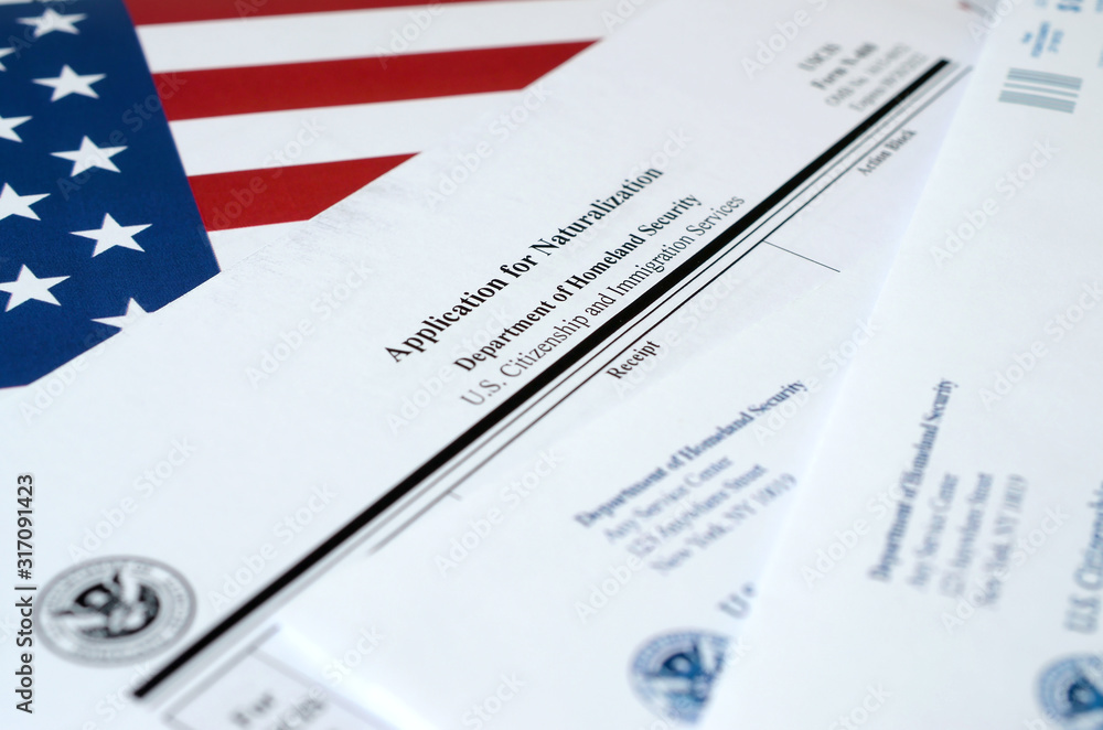 N-400 Application for Naturalization blank form lies on United States ...