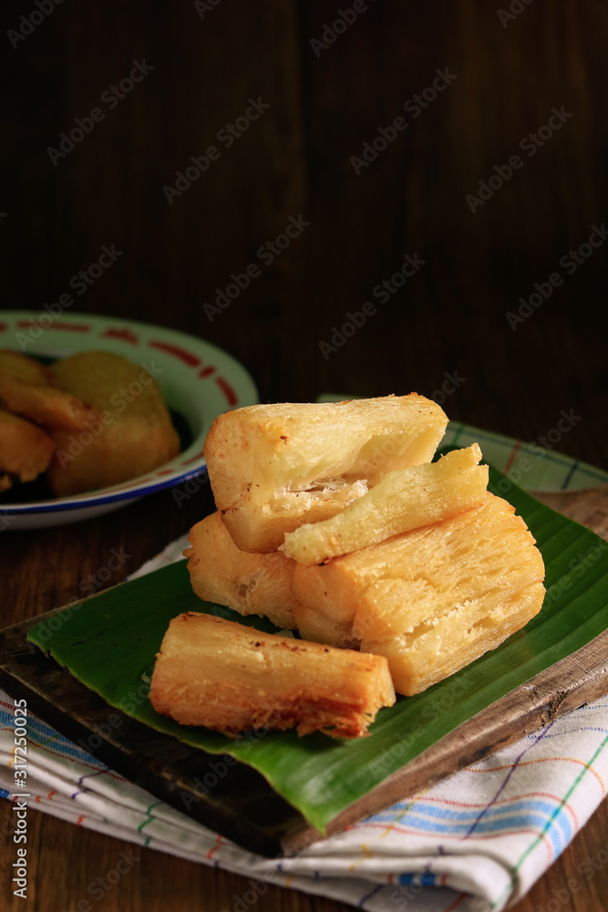 Deep fried cassava root. Brazilian Mandioca Frita (deep fried cassava ...