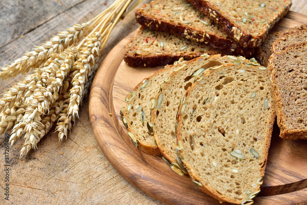 Verschiedene Brotsorten mit Getreide Stock Photo | Adobe Stock